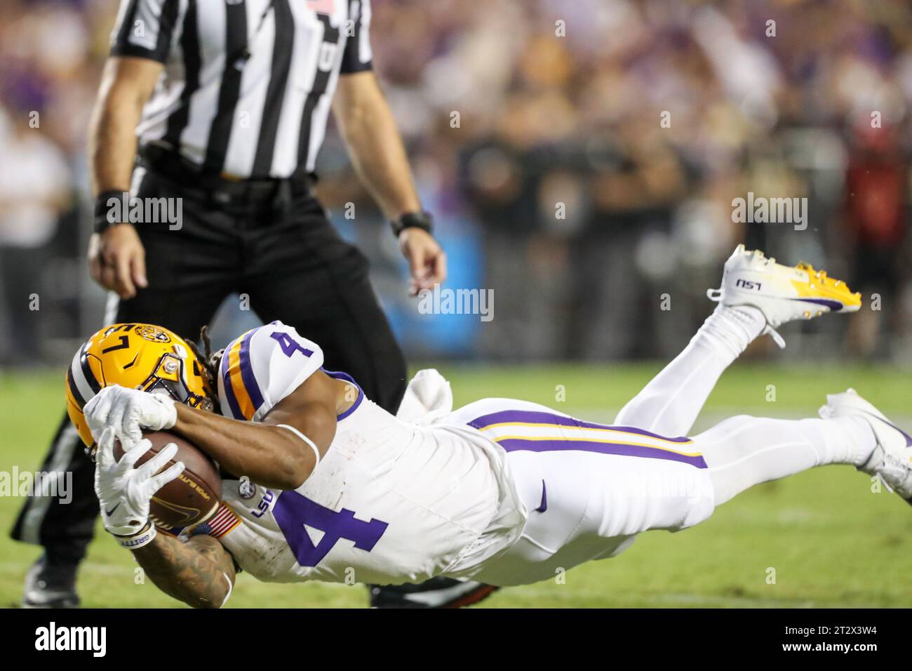 October 21, 2023: LSU running back John Emery Jr. (4) tries to dive ...