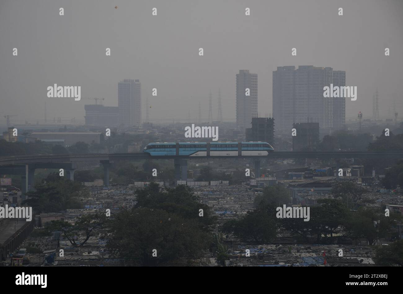Mumbai, India. 21st Oct, 2023. A monorail train is seen passing through ...