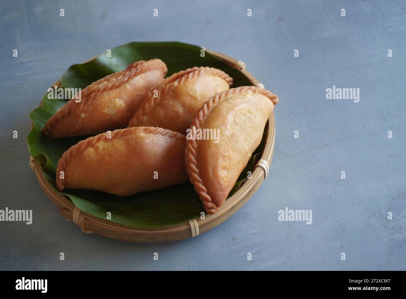 Close up image of Malaysian traditional snack karipap or curry puff ...