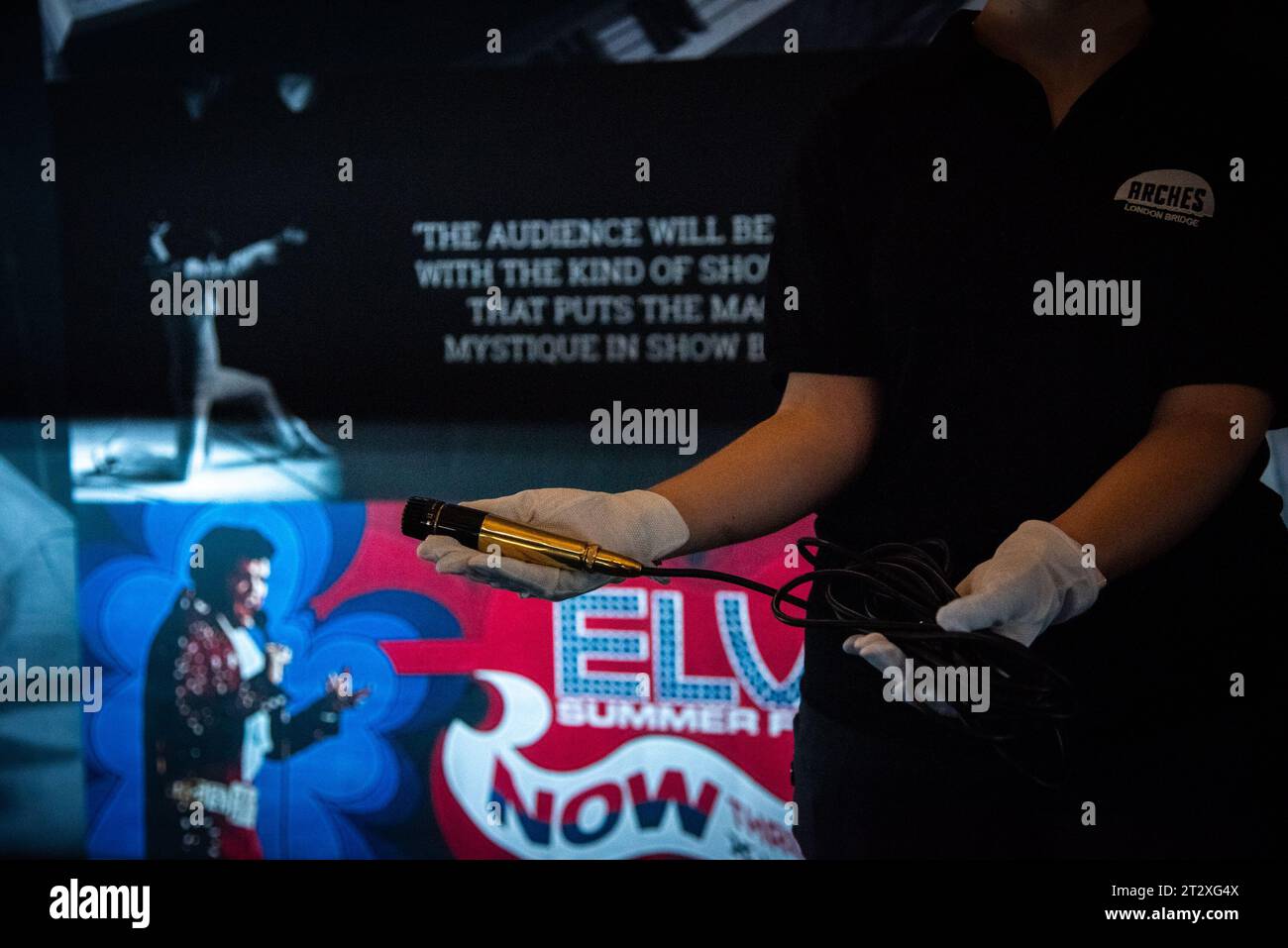 A gold microphone and chord (worth $200,000) used on stage by Elvis at ...