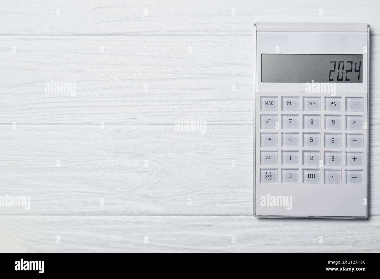 2024 on calculator screen. New year 2024 on the calculator display ...