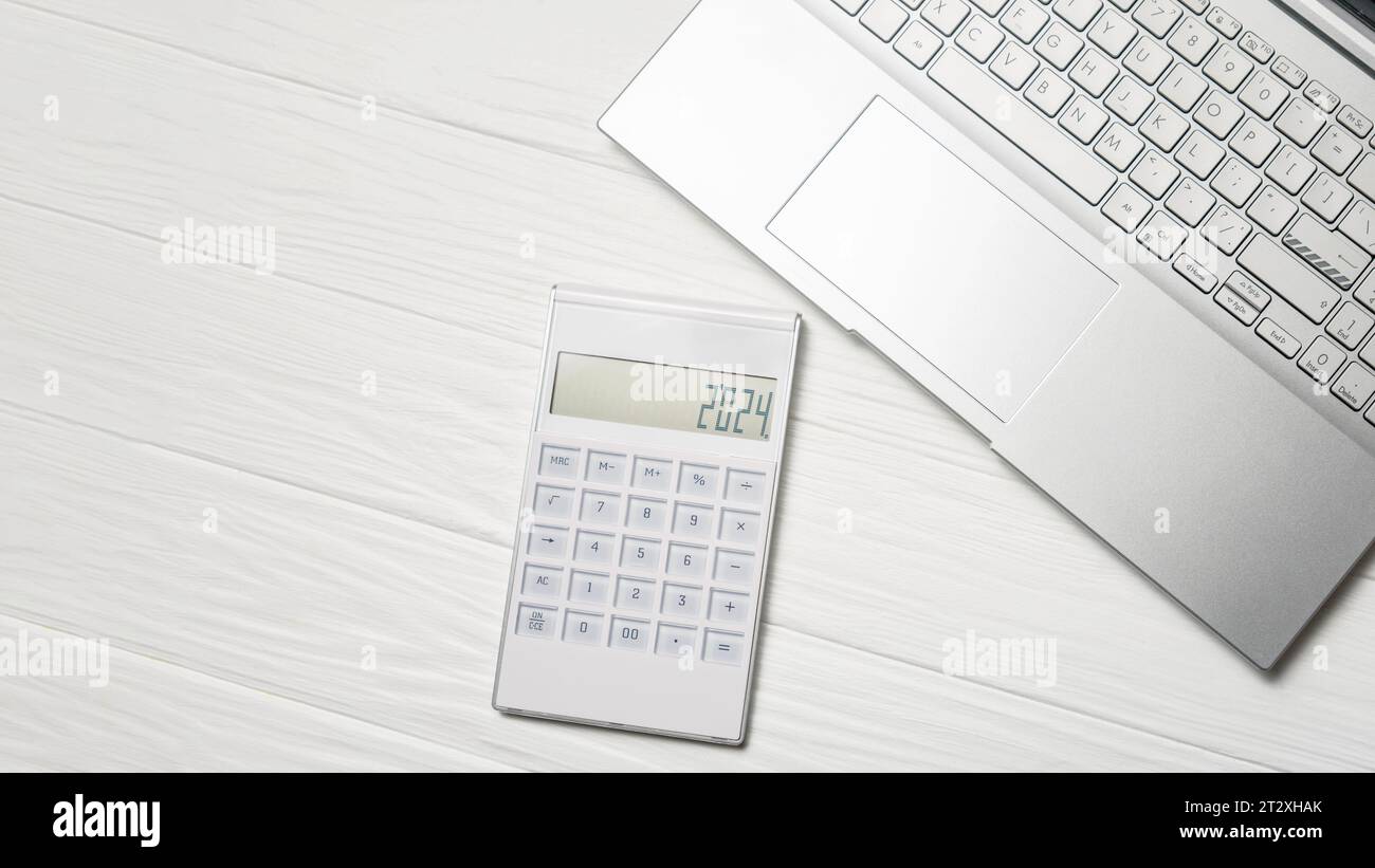 2024 on calculator screen. New year 2024 on the calculator display ...