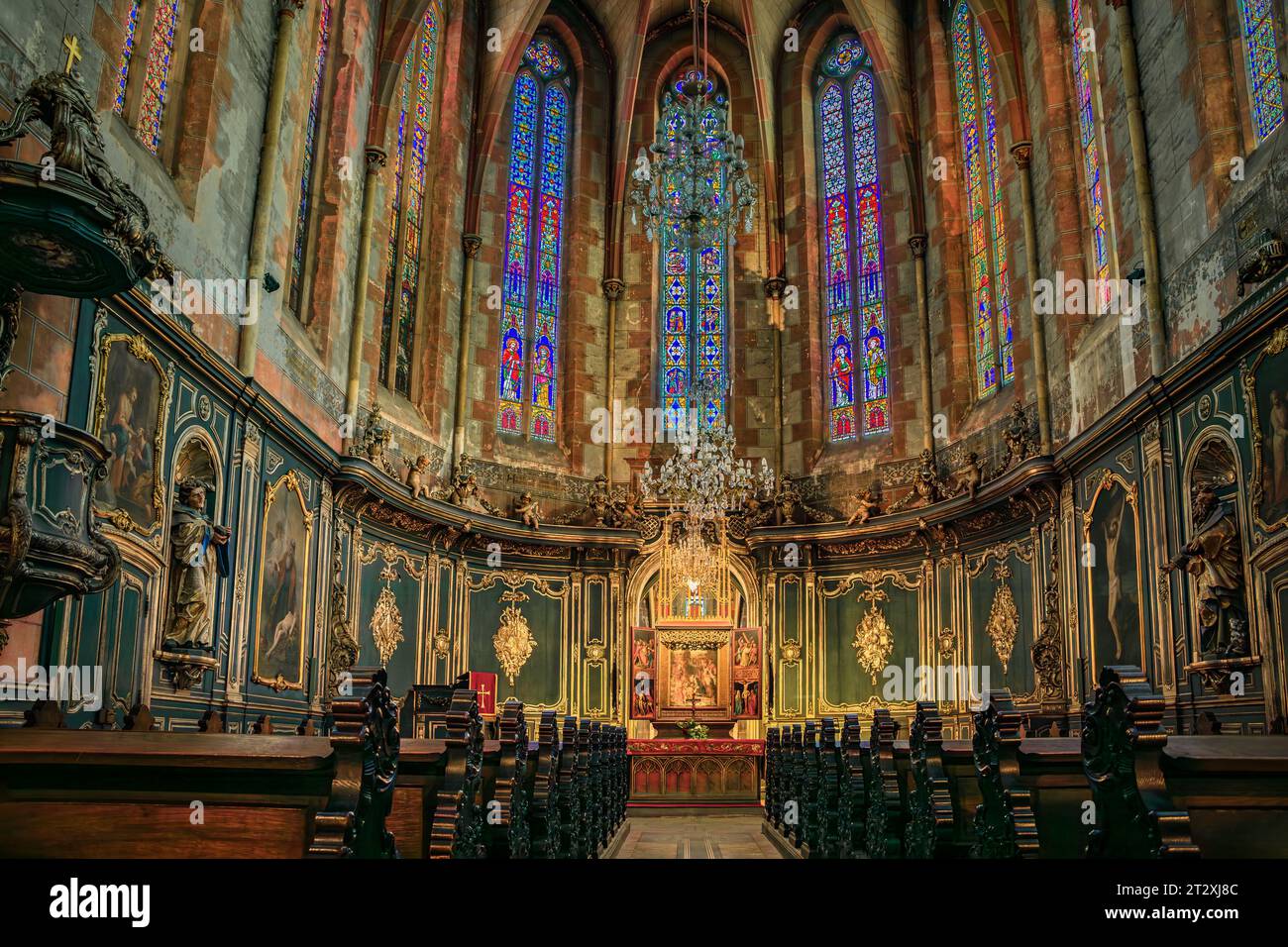 Strasbourg, France - May 31 2023: Ornate chancel with stained glass ...