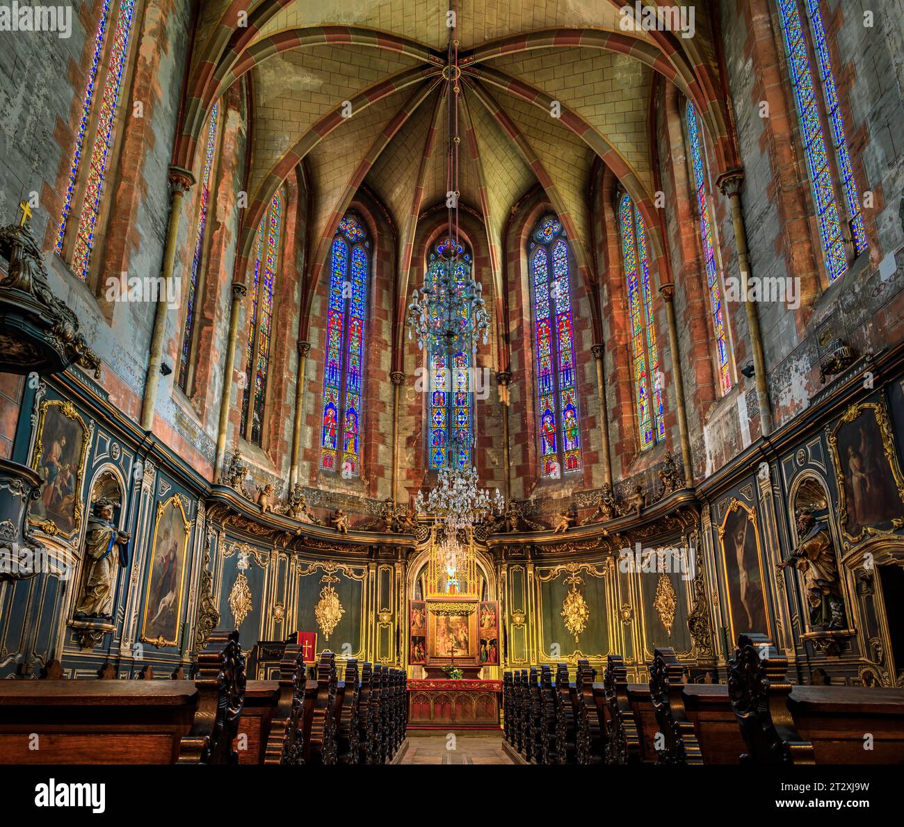 Strasbourg, France - May 31 2023: Ornate chancel with stained glass ...