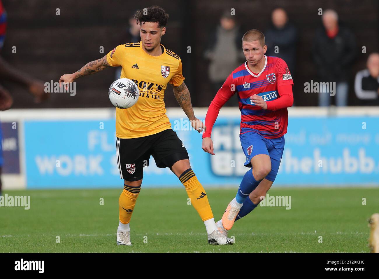 Lewis Walker of Woking and Sam Ling of Dagenham and Redbridge during ...