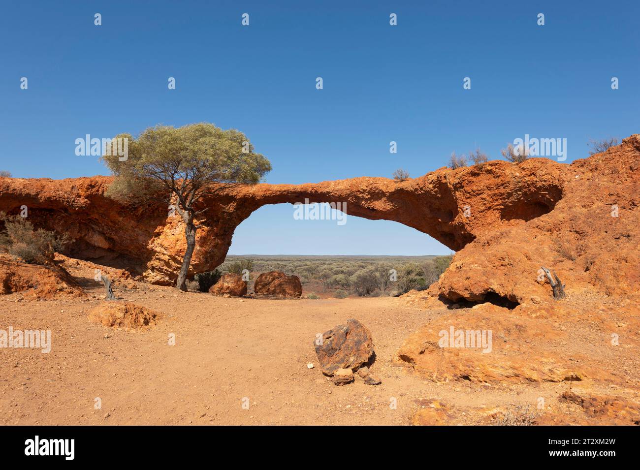 Natural sandstone bridge rock formation, a popular tourist attraction ...