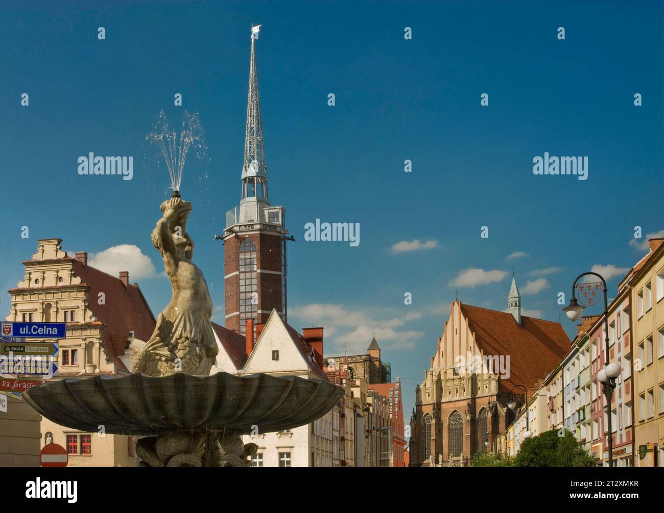 Triton Fountain and tower of New Town Hall at Rynek (Market Square) in ...