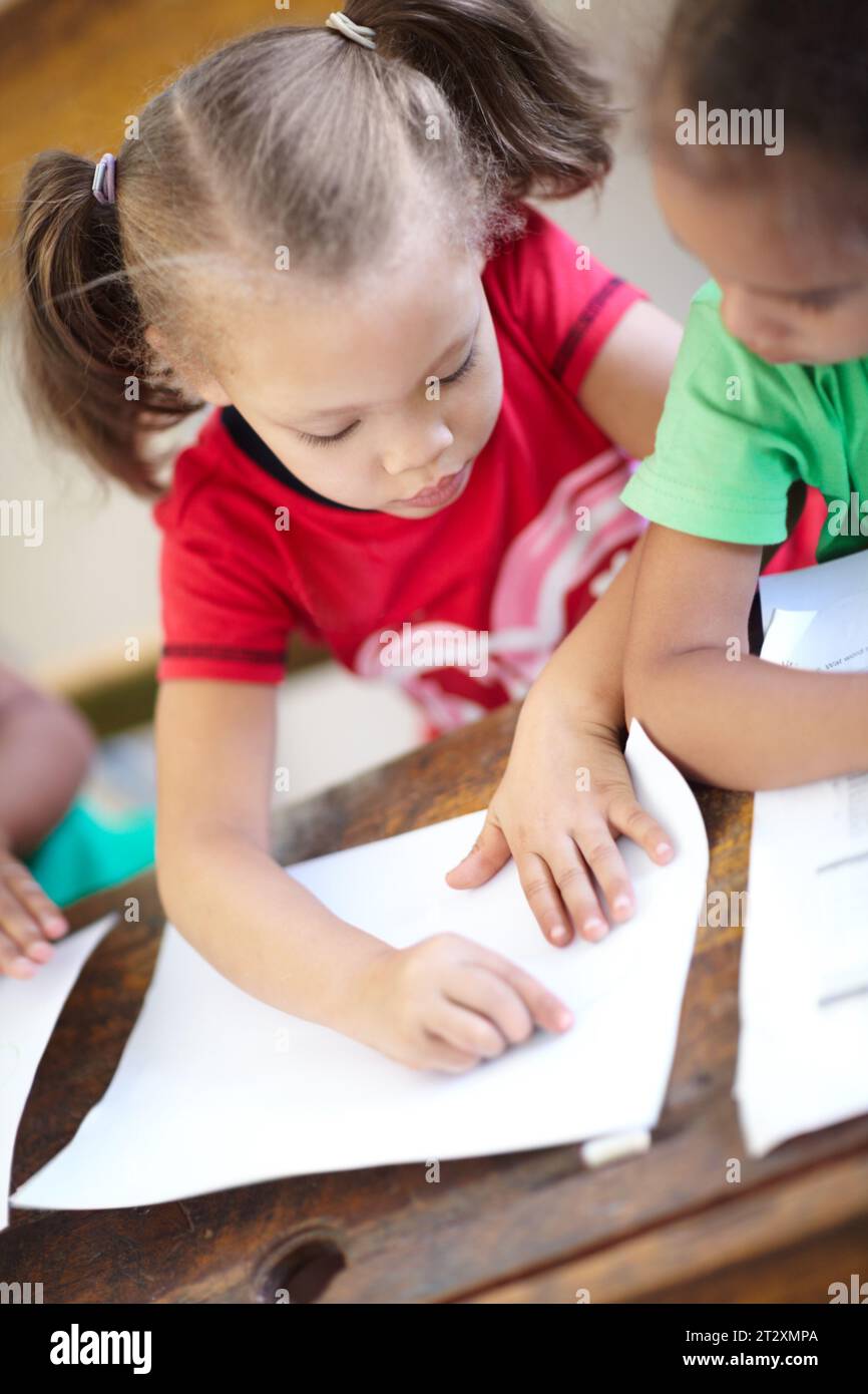 Students, education and girls in a classroom, drawing and knowledge ...