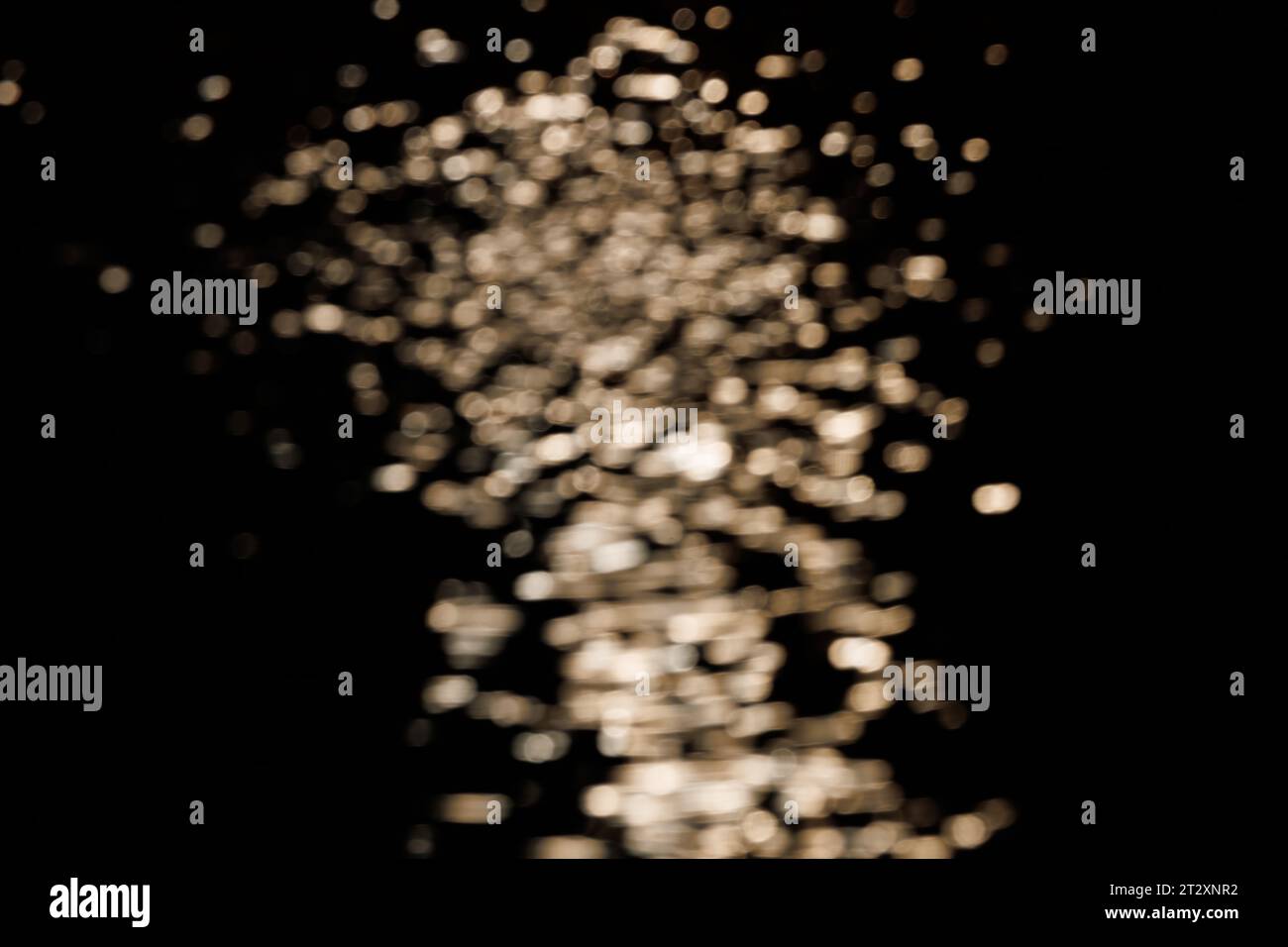 Blurred bokeh with sparkling water glitter with cool mist flash effect ...