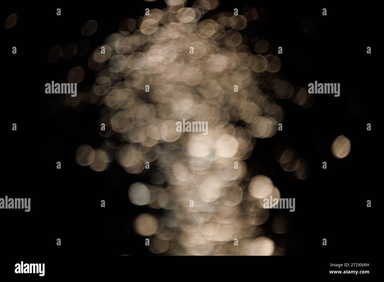 Blurred bokeh with sparkling water glitter with cool mist flash effect ...