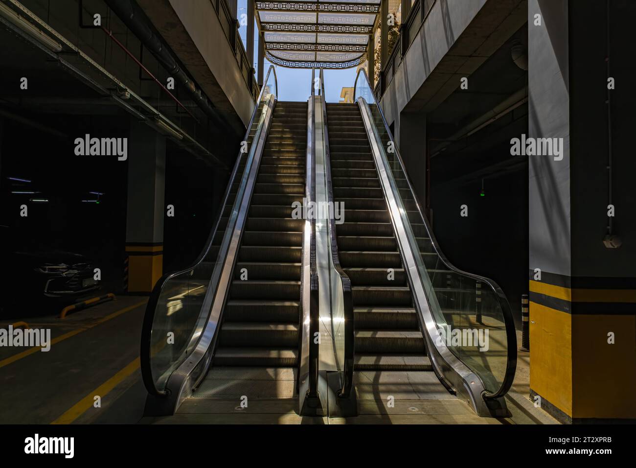 Modern urban indoor staircase escalator for climbing up to a business ...