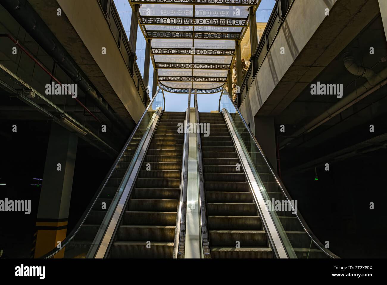 Modern urban indoor staircase escalator for climbing up to a business ...