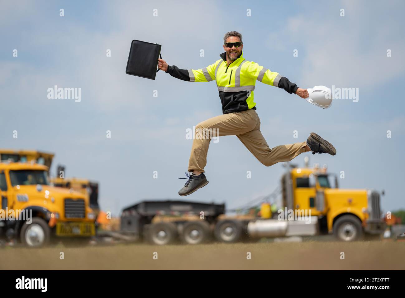 Construction builder excited jump hi-res stock photography and images ...