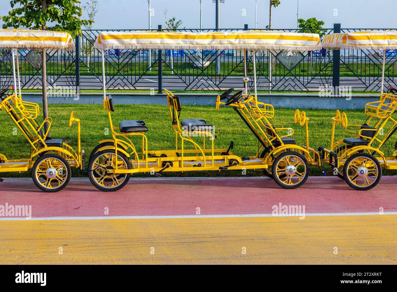 Park four-wheeled bicycle for transportation and fun Stock Photo - Alamy
