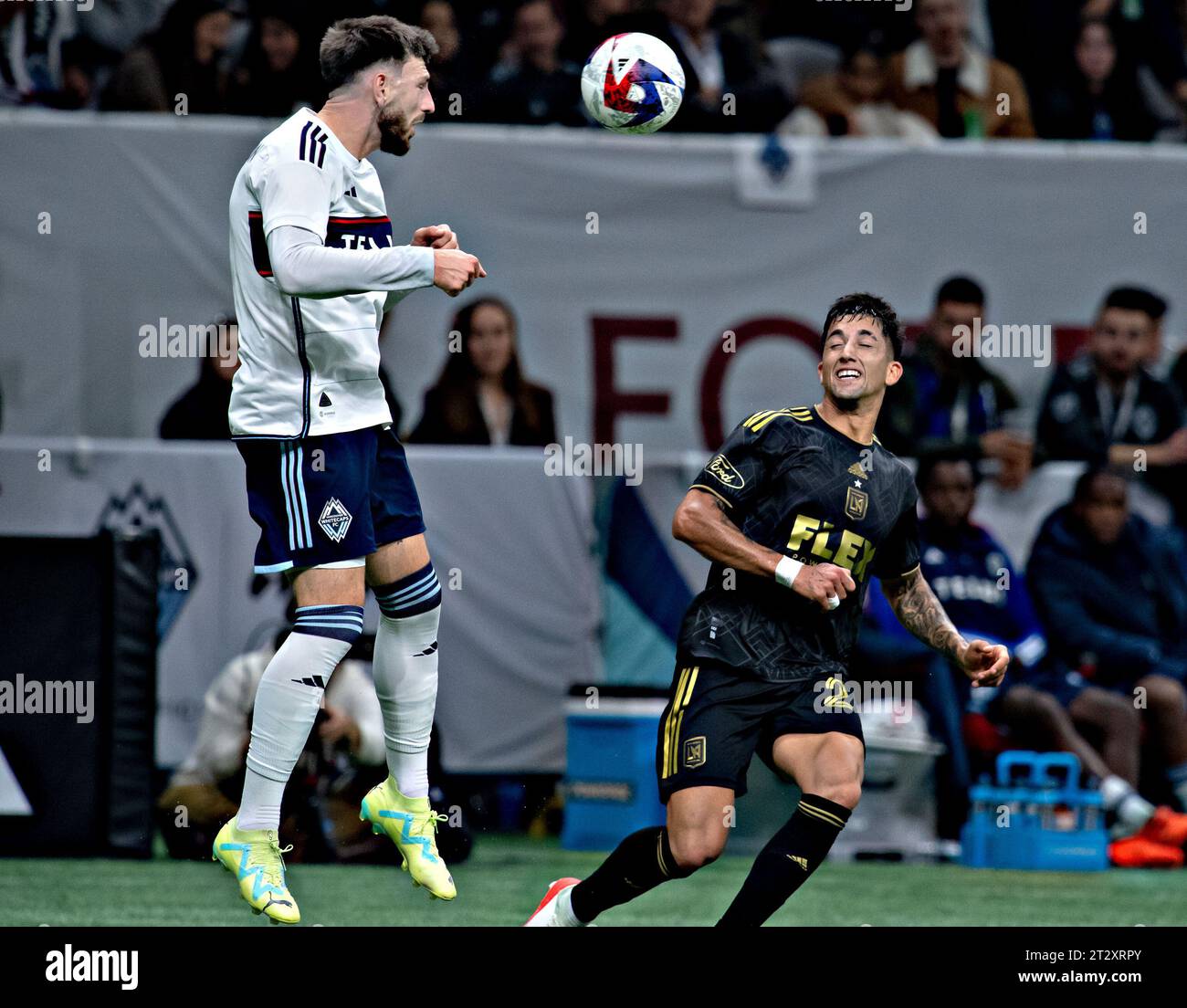 Vancouver, Canada. 21st Oct, 2023. Vancouver Whitecaps FC's Tristan Blackmon (L) and Los Angeles ...