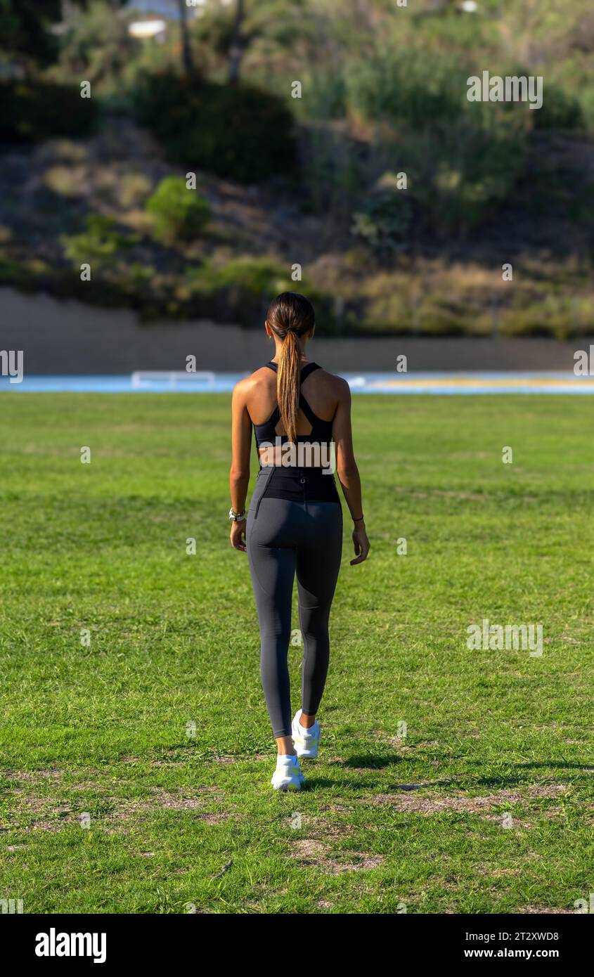 Beautiful long tanned female legs hi-res stock photography and images ...