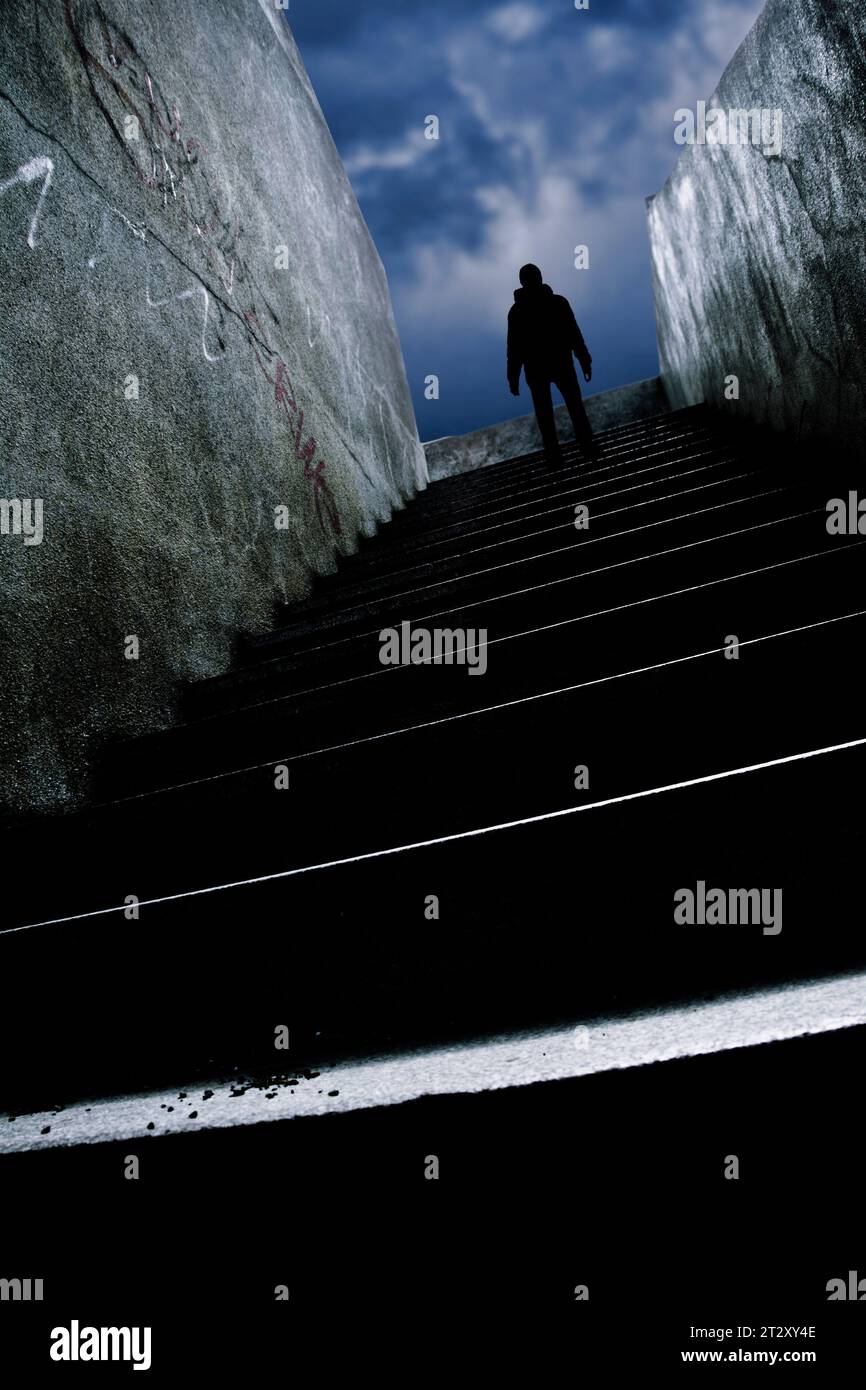 mysterious man standing on top a stairs, slanted dramatic angle Stock ...