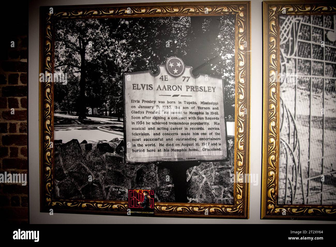 A photo of Elvis Presley's cemetery tombstone, displayed at the Direct ...