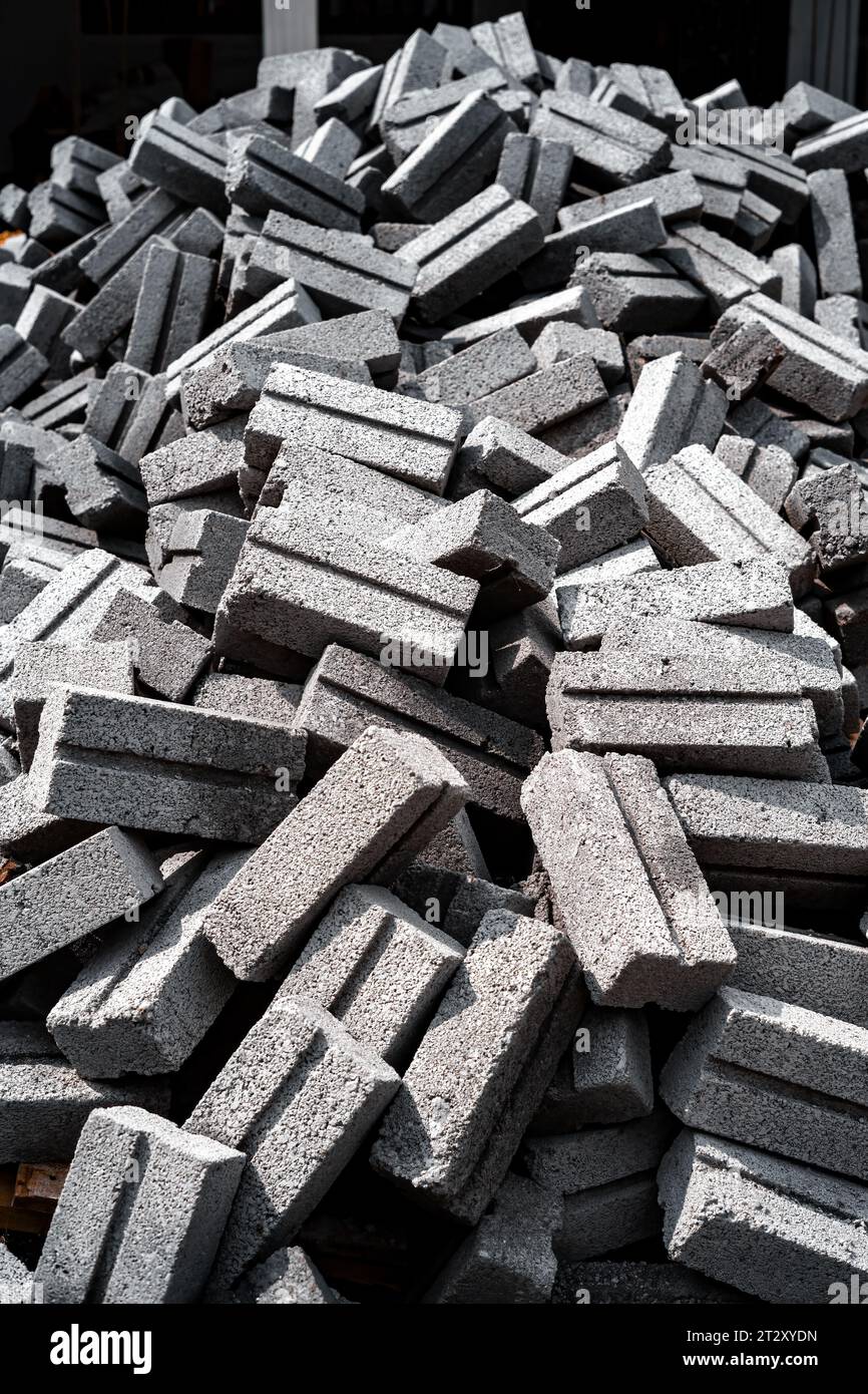 Pile of concrete bricks at the construction site Stock Photo - Alamy