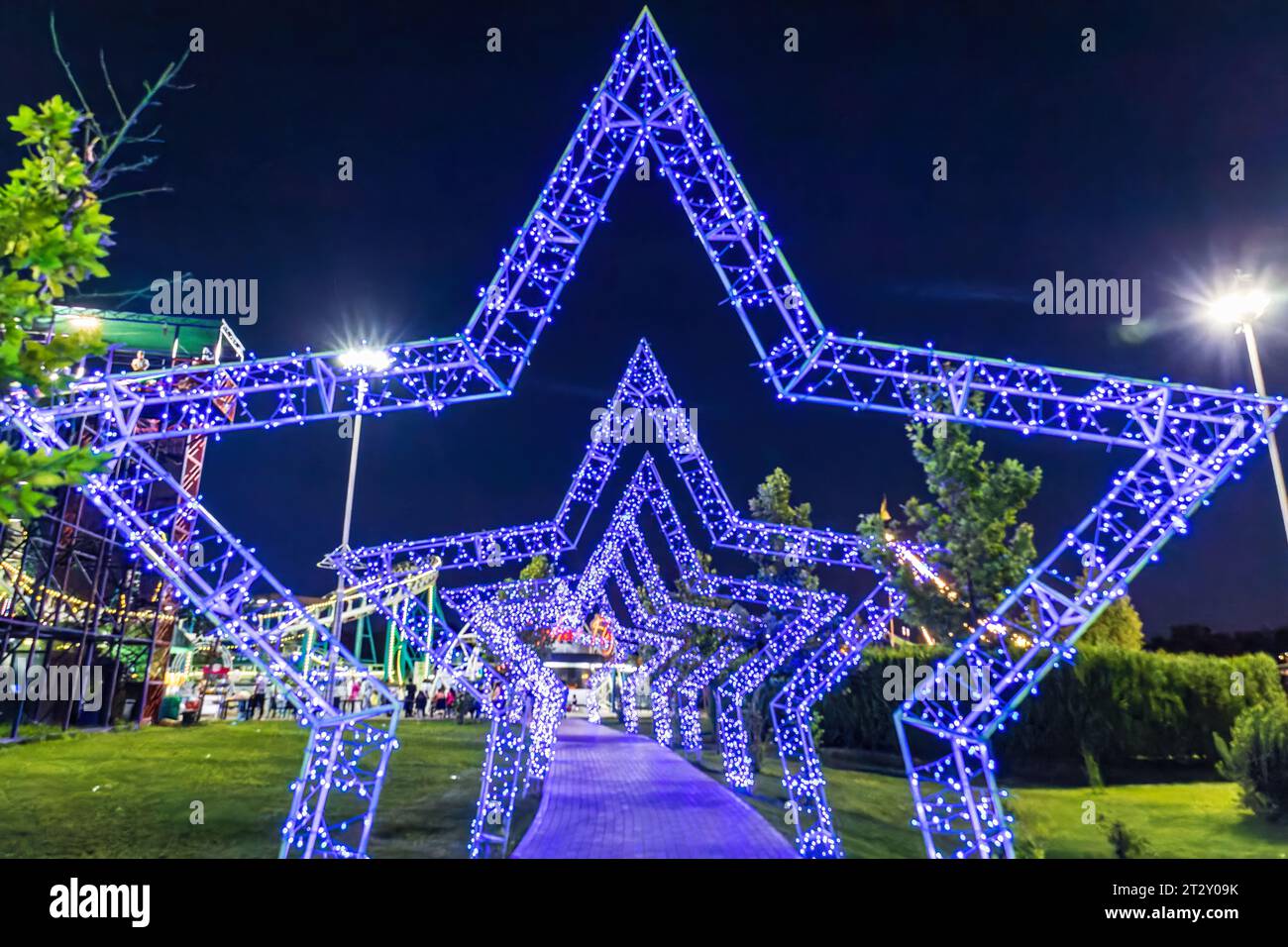 Street path with beautiful lighting, park area Stock Photo - Alamy