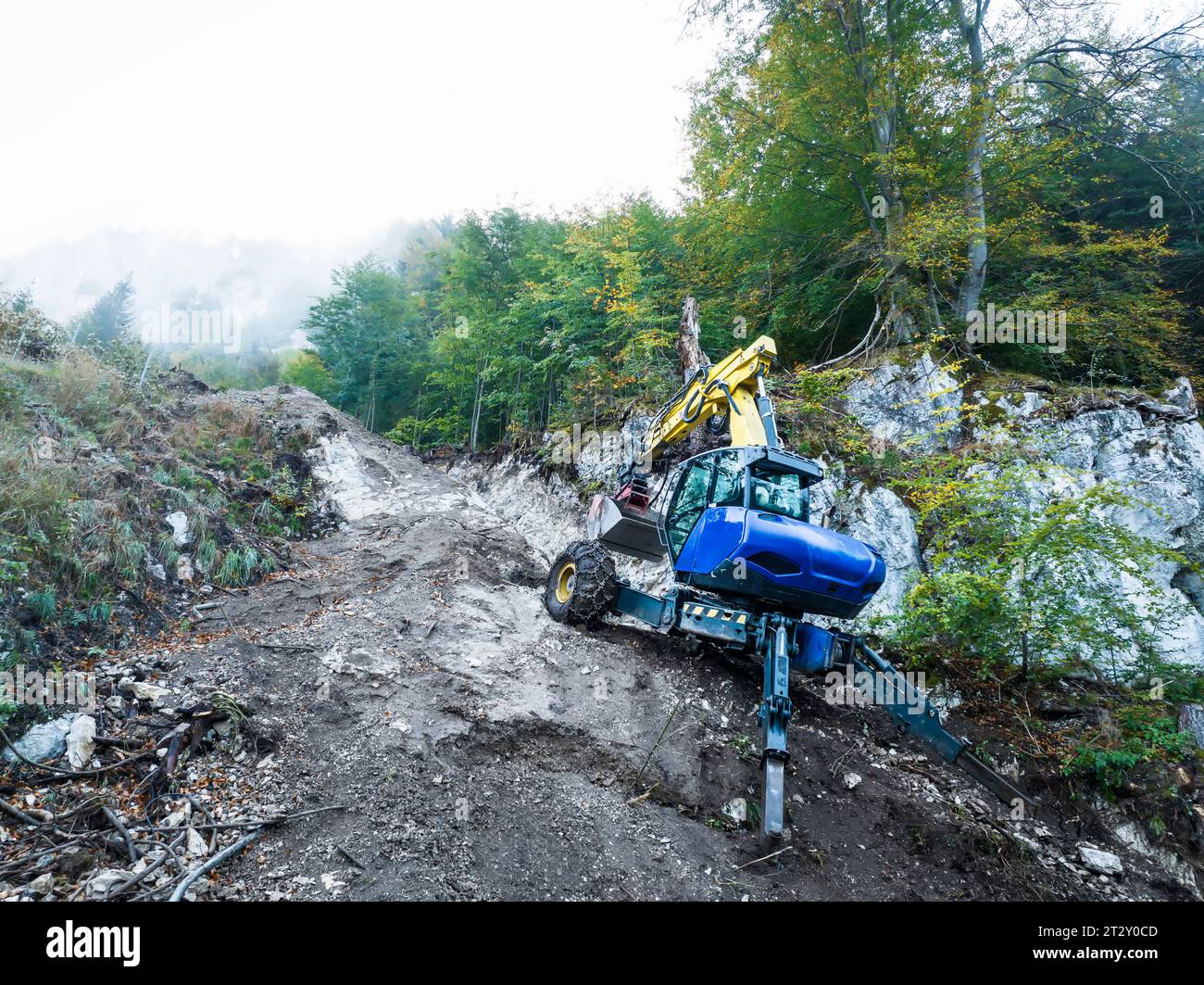 Walking excavator or hopping excavator in the very steep, difficult ...