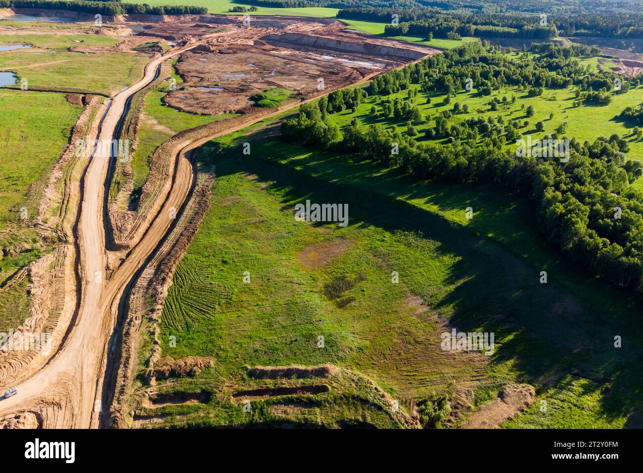 Sand and gravel quarry with access roads, aerial view Stock Photo - Alamy
