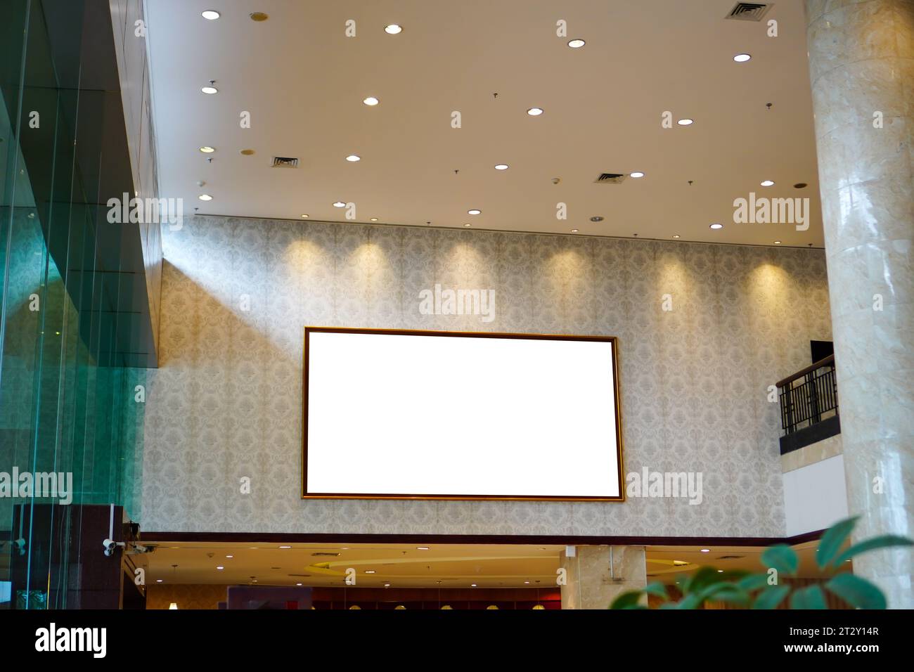 a gigantic empty frame hanging in a magnificent and spacious hall ...