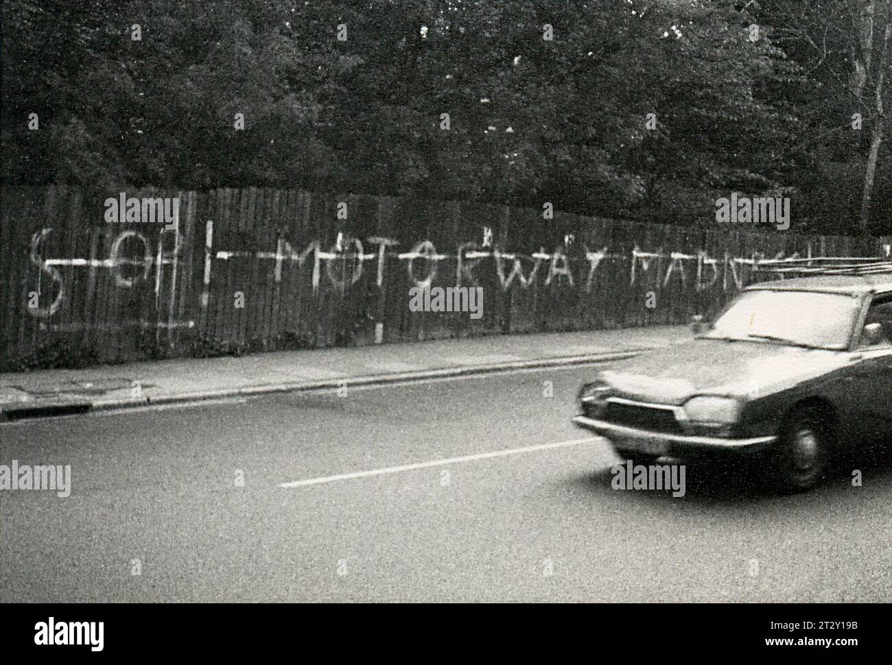 1970s black & white archive photograph of graffiti in Archway Road ...