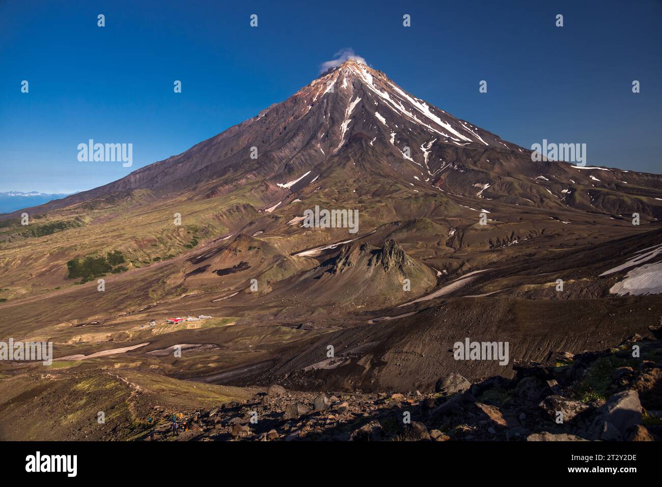 Verblyud (Camel) extrusion rock and the Koryaksky volcano on Kamchatka ...