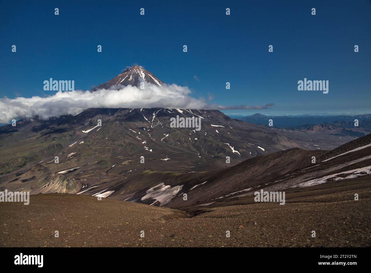 view of the peaks of the Koryak volcano on the Kamchatka peninsula ...
