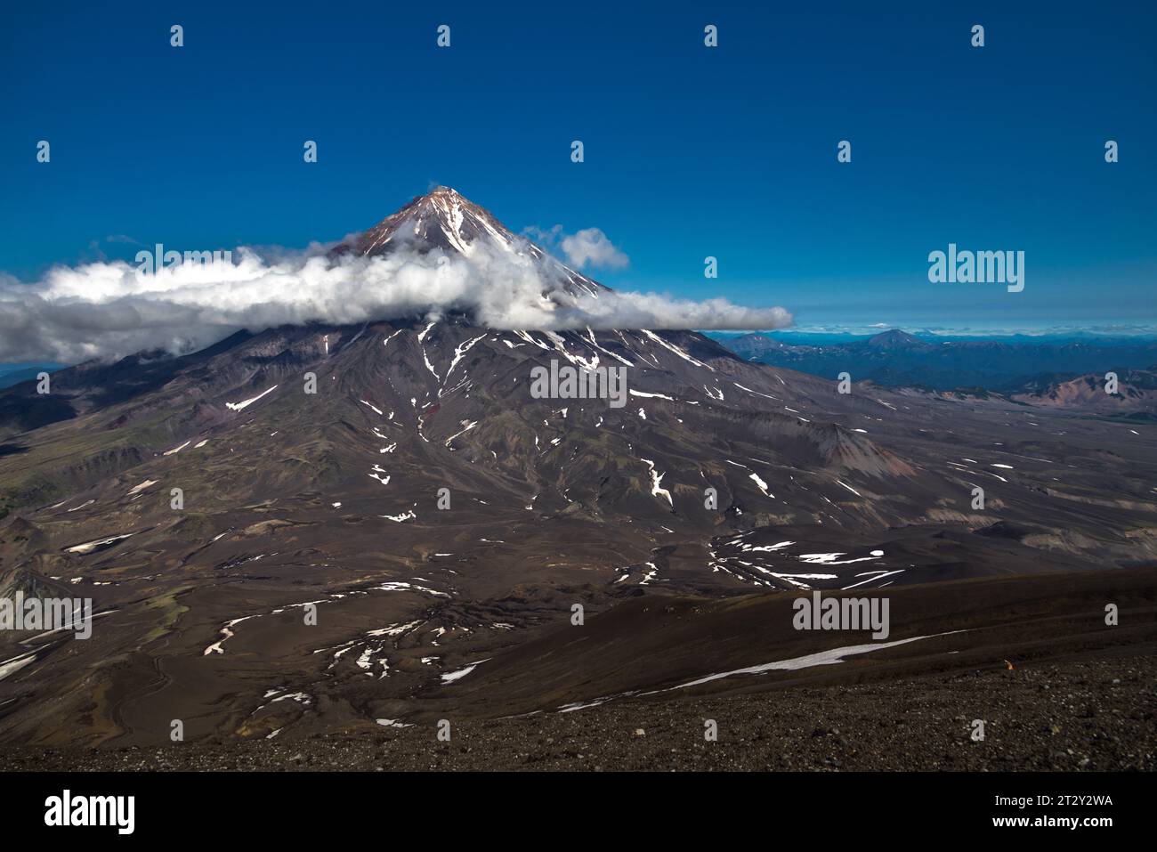 view of the peaks of the Koryak volcano on the Kamchatka peninsula ...