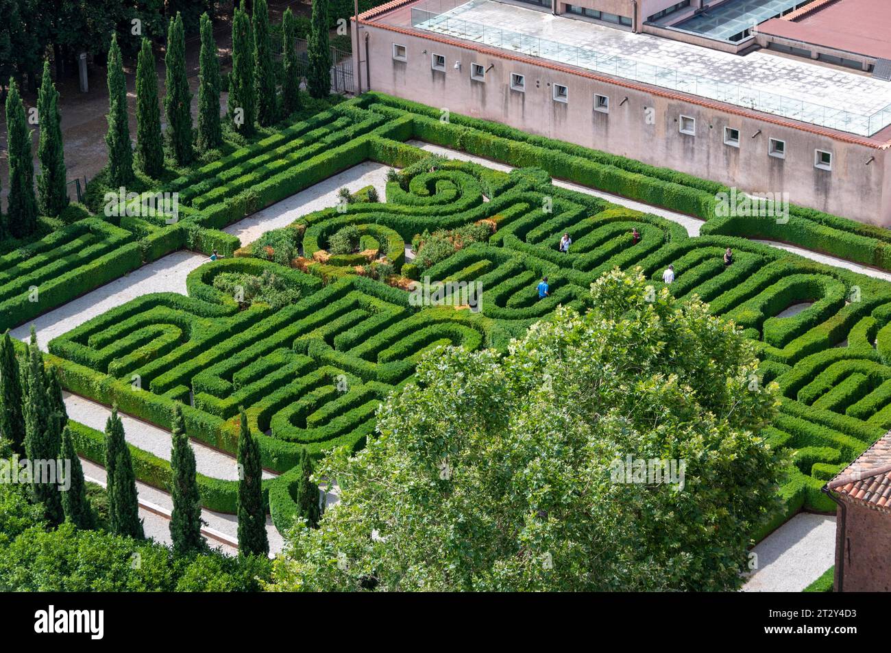 Visitors trying to find their way in this huge Labirinto Borges on the ...