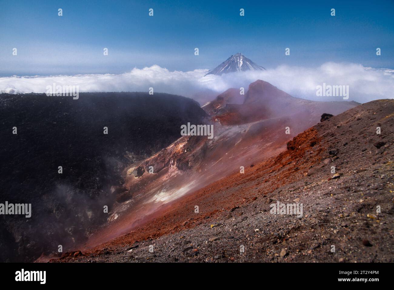 Kamchatka volcanic landscape: view to top of cone of Koryaksky Volcano ...