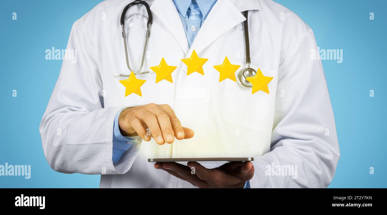 Doctor with tablet, surrounded by glowing 5-star rating Stock Photo - Alamy