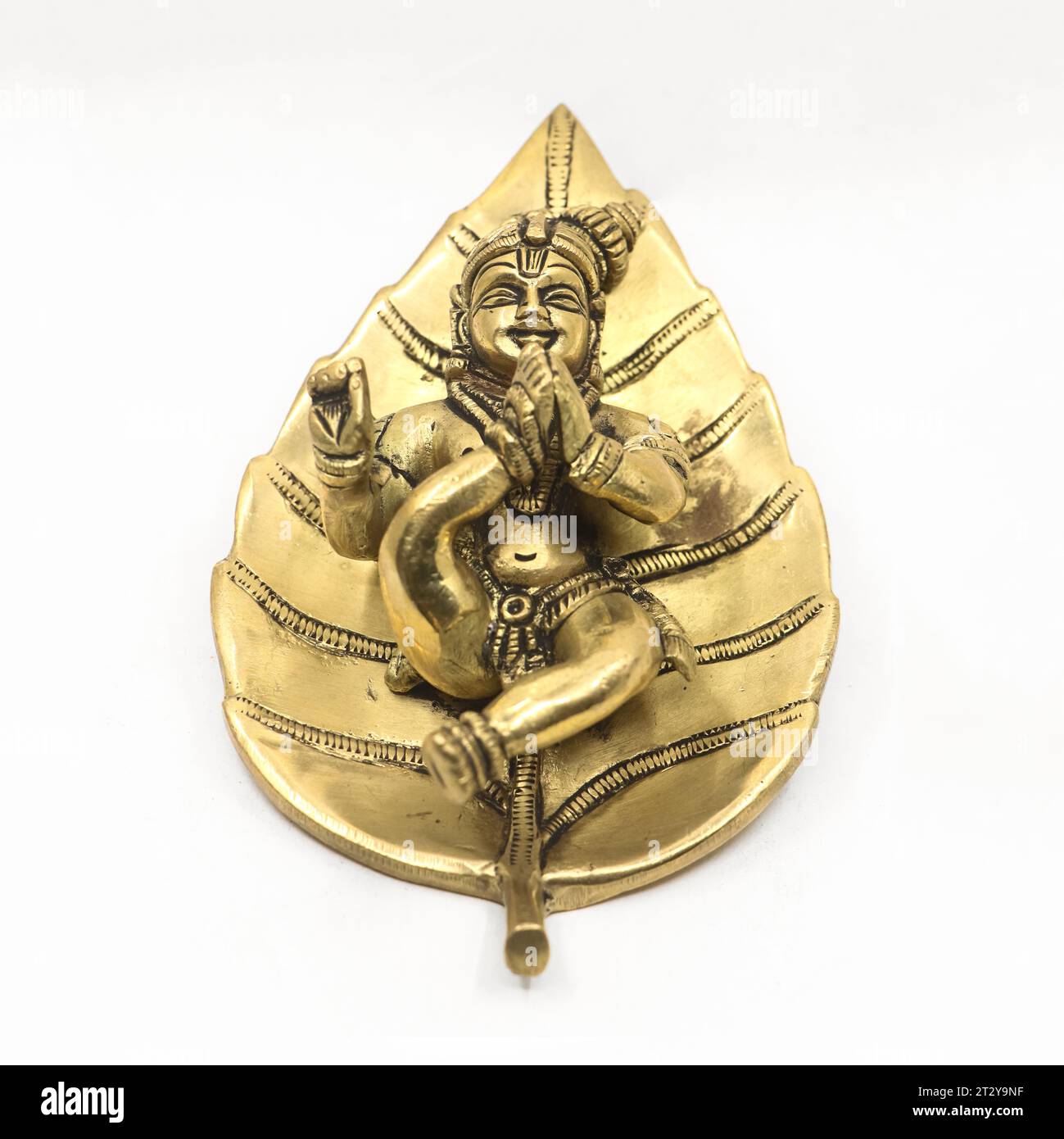 hindu god lord baby krishna on a leaf statue crafted in detail on shiny ...