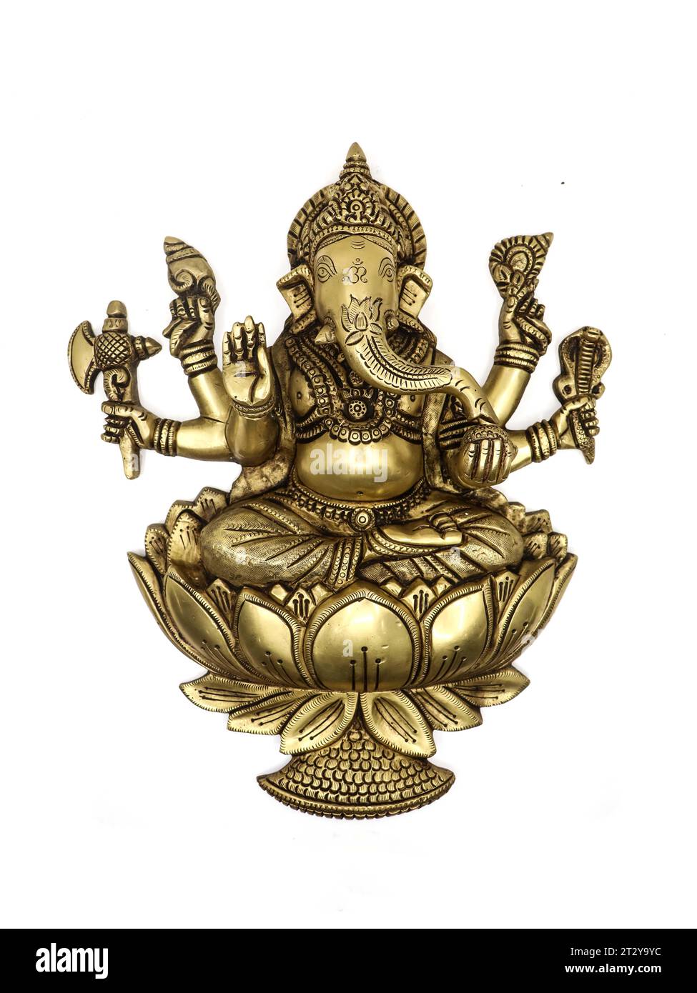gold statue of hindu god lord ganesh with multiple hands sitting with legs crossed in a lotus ...