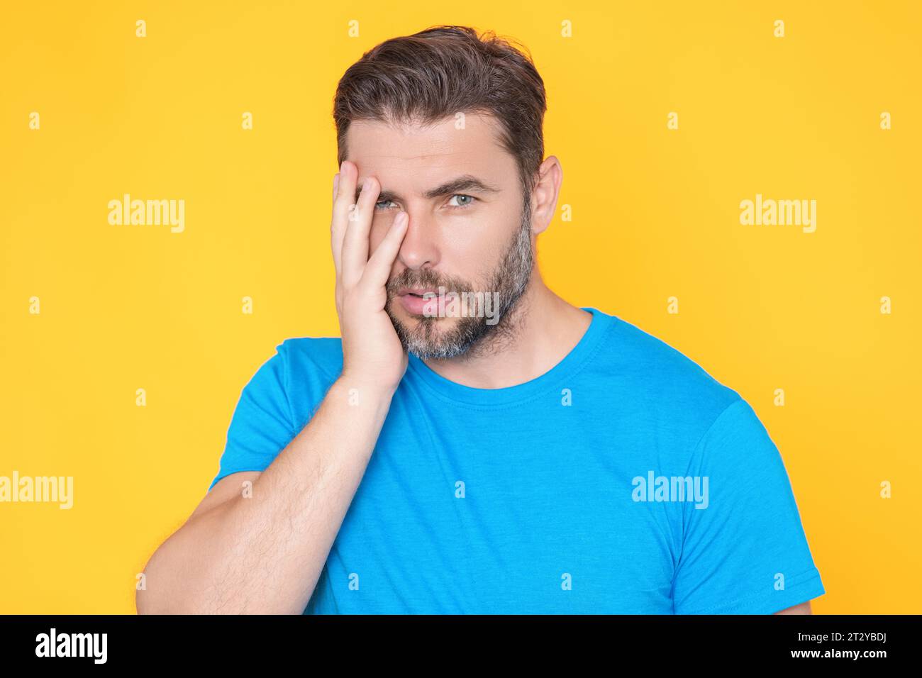 Pensive man isolated on studio background thinking. Thoughtful man ...