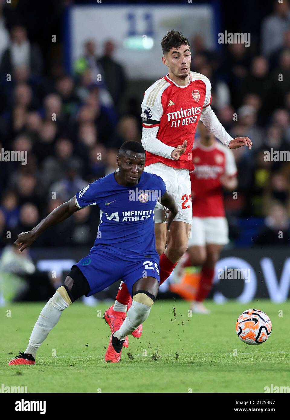 London, England, 21st October 2023. Moises Caicedo of Chelsea tussles ...