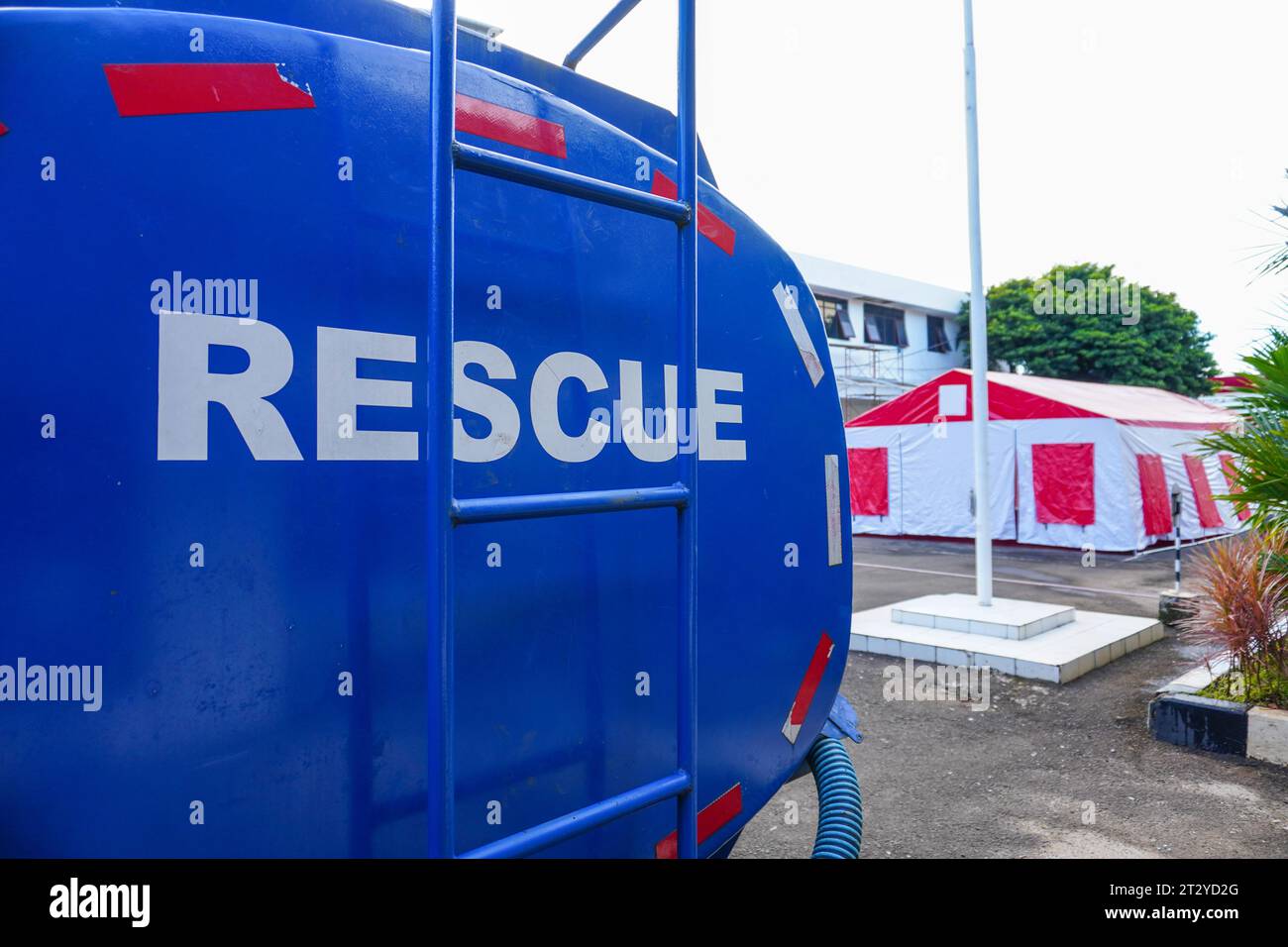 Selective attention on the 'Rescue' writing at the rear of a blue water ...