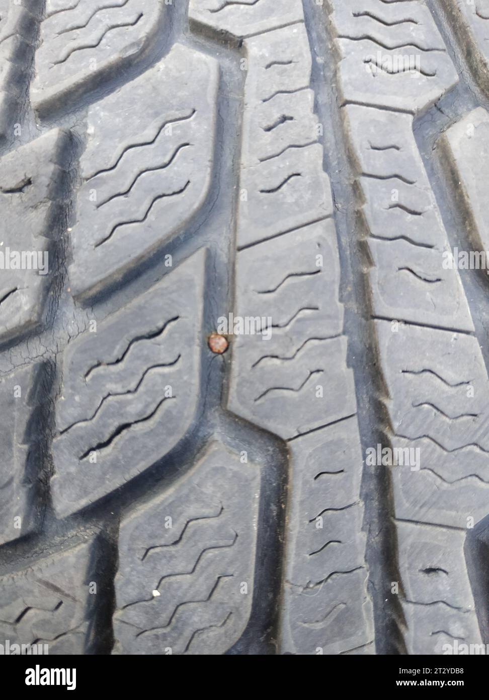 Old worn car tires. Damaged rubber. Old tyres. Recycling of rubber ...