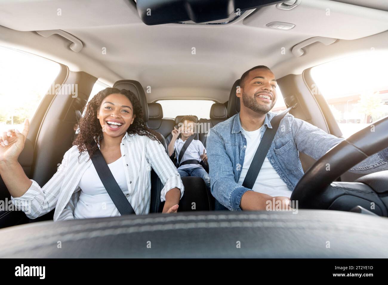 Happy african american family riding car, traveling by automobile Stock ...