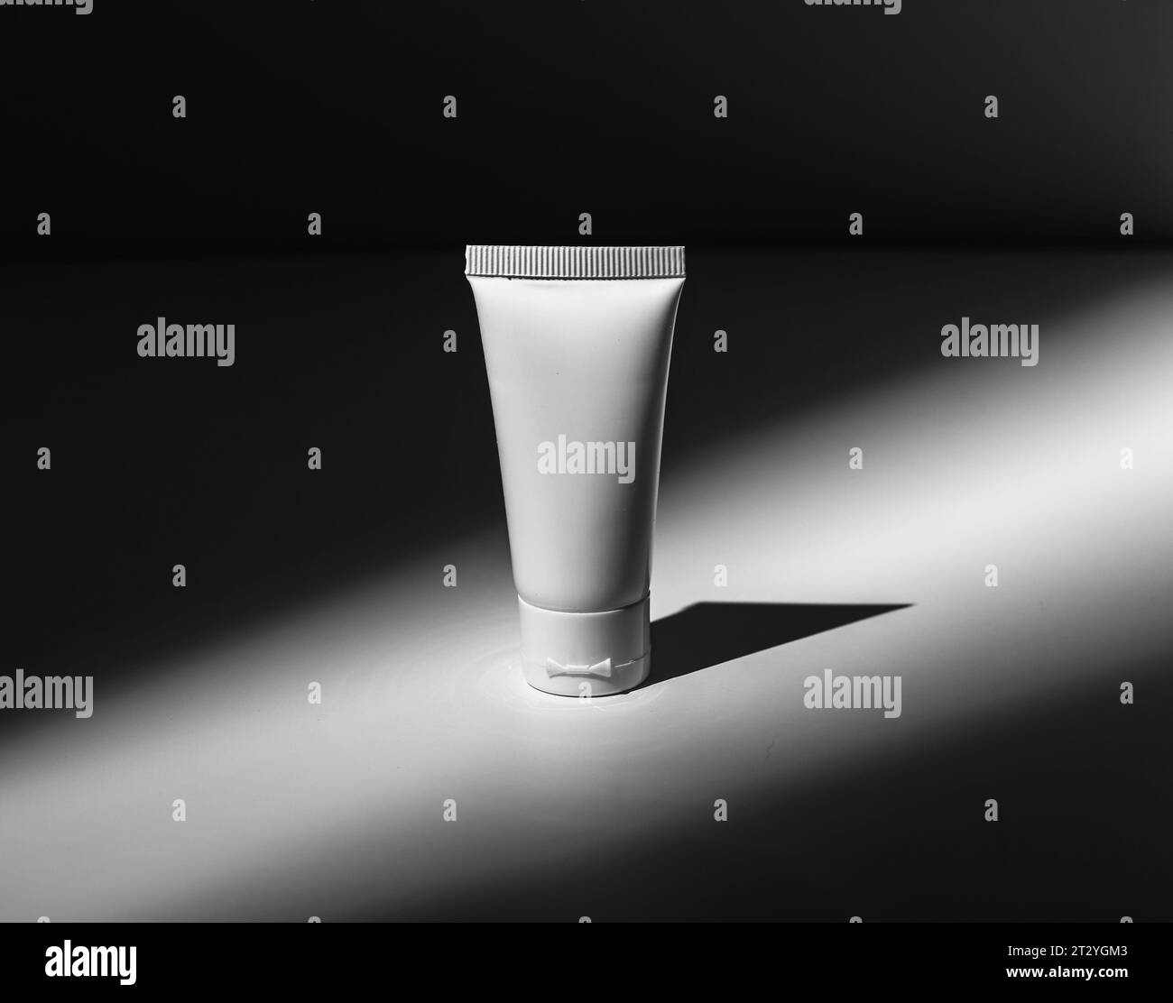 Cream tube mockup, cosmetic product mock up in light beam Stock Photo ...