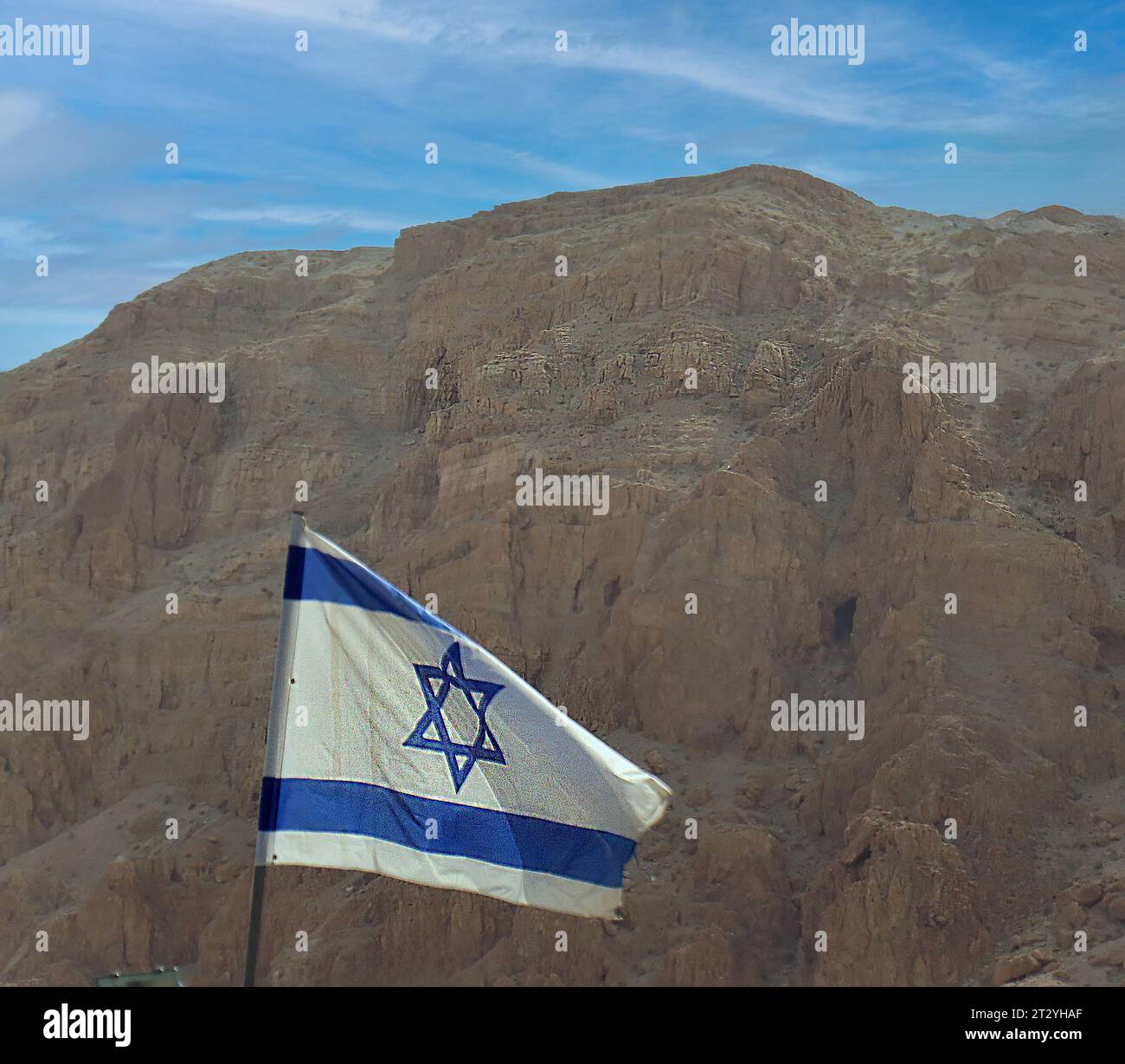 Israeli country flag outside with stone mountains in background Stock ...