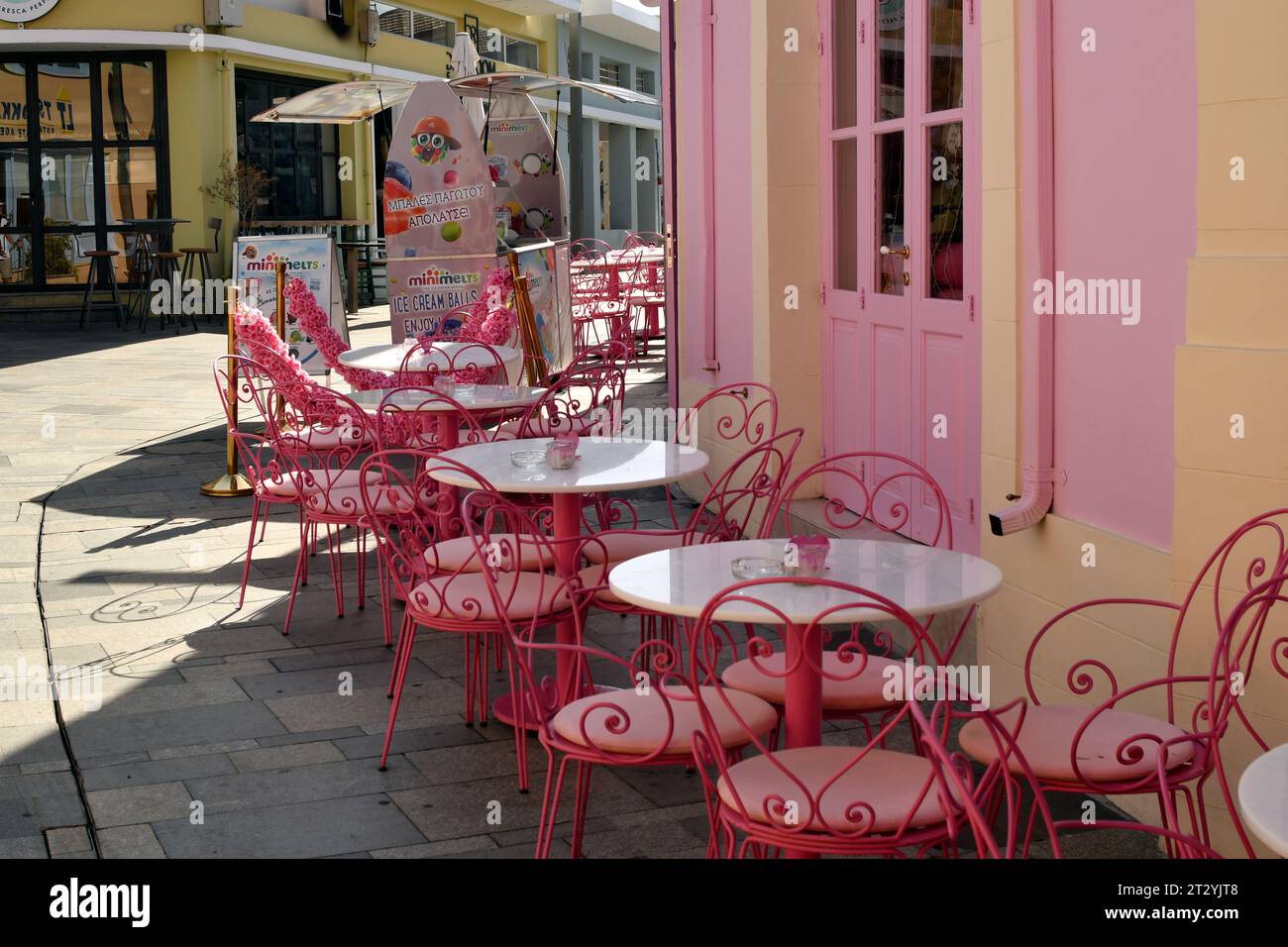 Paphos, Cyprus - September 27, 2023: Pastry shop with table and chairs ...