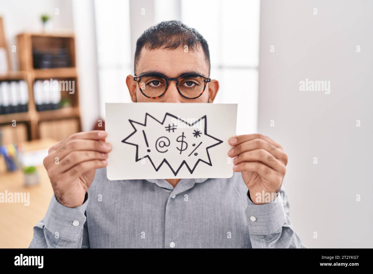 Middle east man with beard holding banner with swear words depressed ...