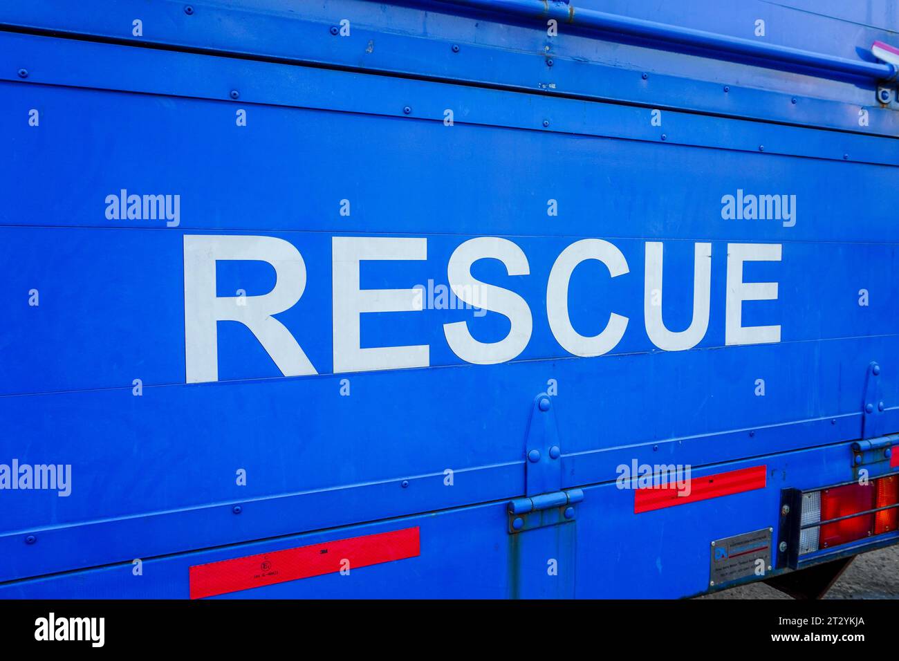 Focus on the words "Rescue" on the back of the truck in blue for ...