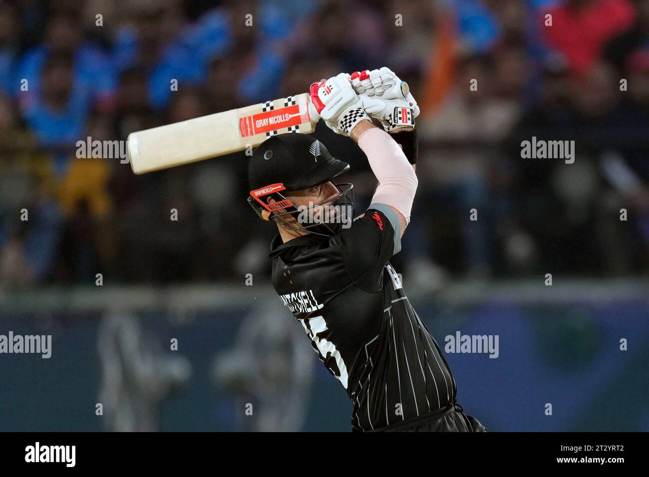 New Zealand's Daryl Mitchell plays a shot during the ICC Men's Cricket ...