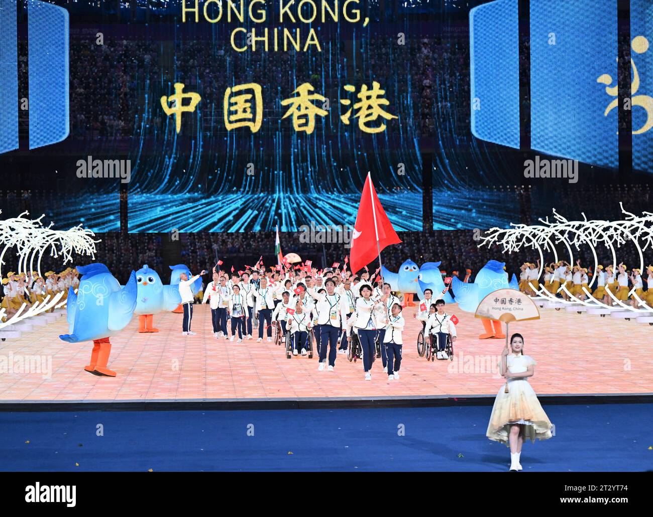 Hangzhou, China parade into the Hangzhou Olympic Sports Center Stadium ...