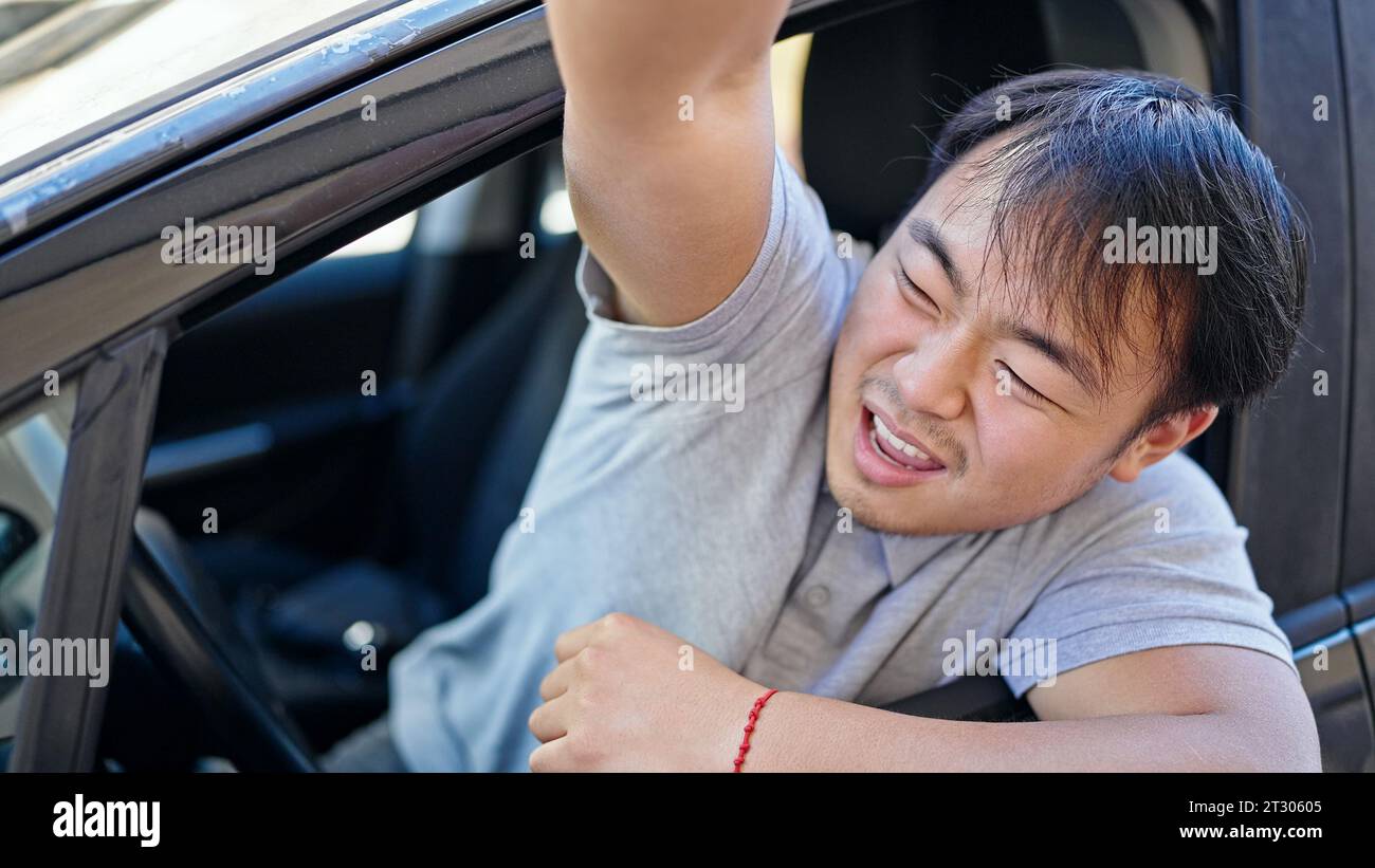 stressed driving car screaming at street Stock Photo - Alamy