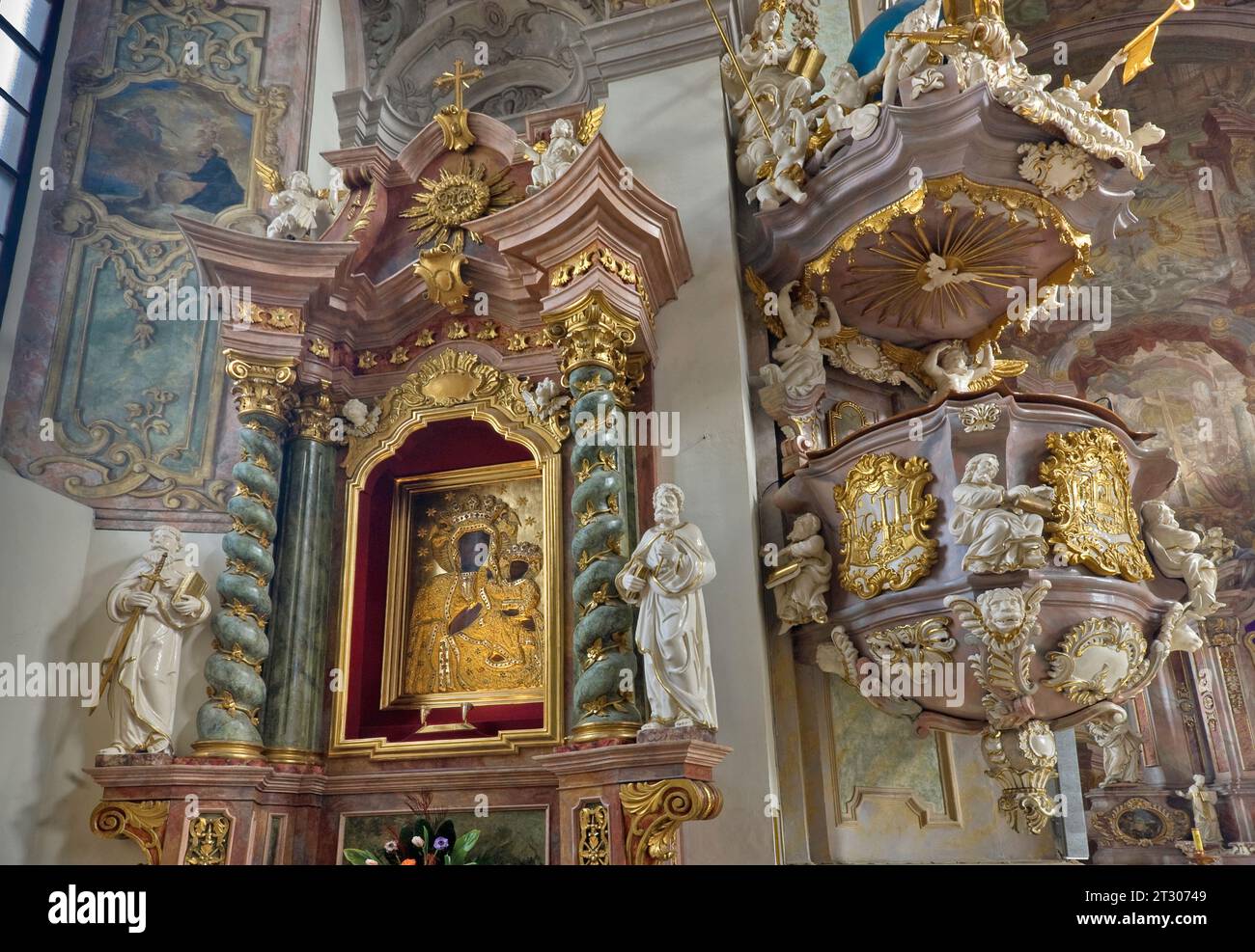 Black Madonna, a patron of Poland, painting at side altar, pulpit, at ...